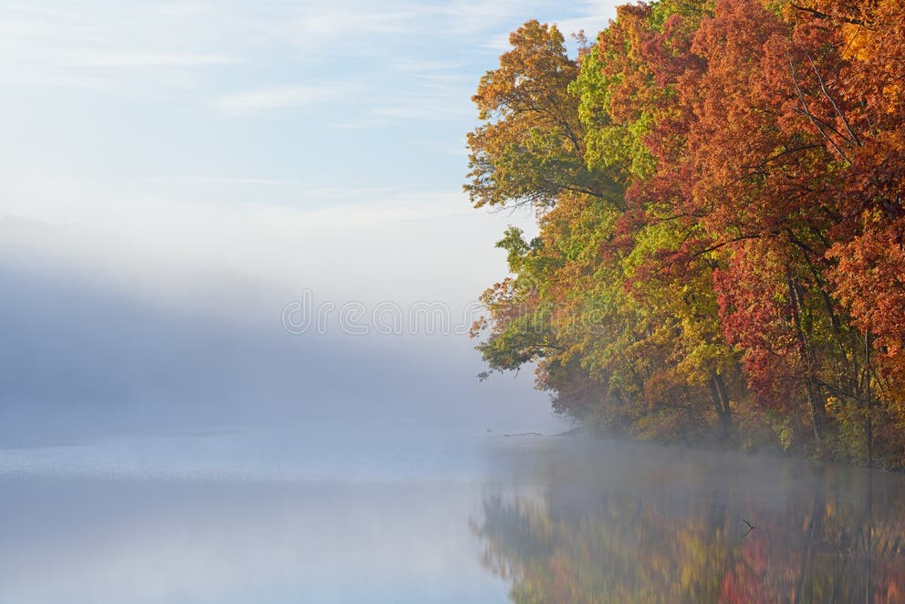 Autumn Shoreline in Fog stock photo. Image of water, peaceful - 28603906