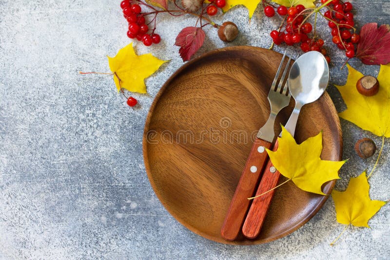 Thanksgiving or Autumn Harvest Table Setting with Rustic Silverware and ...