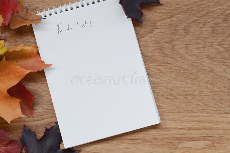 Autumn Theme Background with Leaves Over Oak Wood Table with To Do List ...