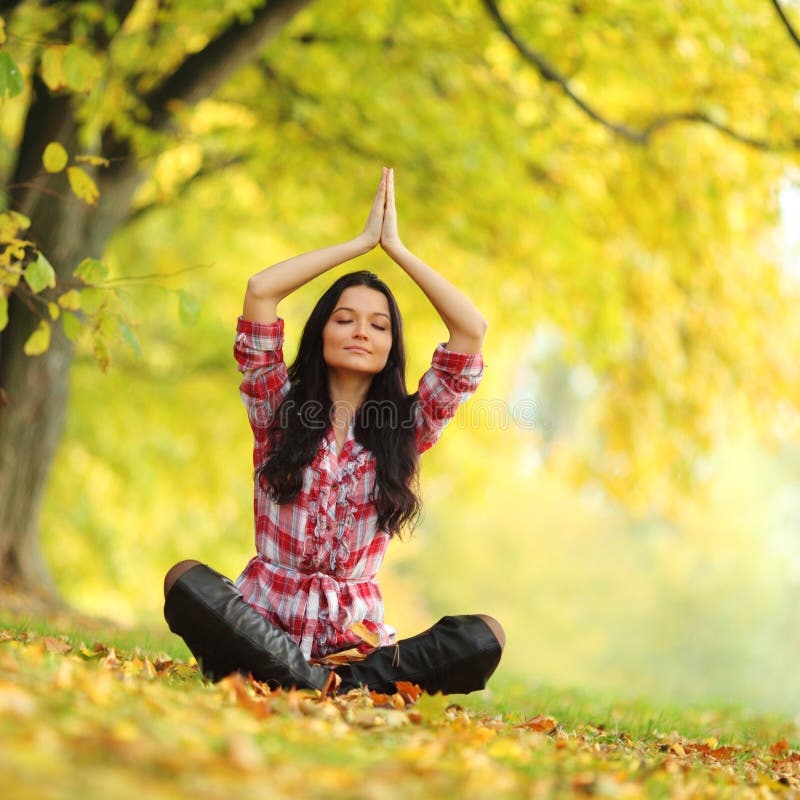 Yoga in autumn stock image. Image of position, october - 25972219