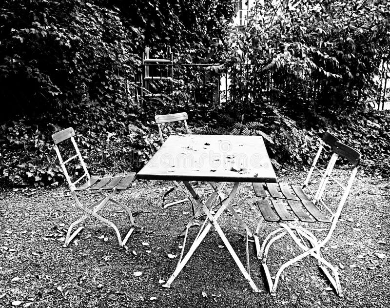 Autumnal Garden, Chairs, Table and Fallen Leaves Stock Photo - Image of ...