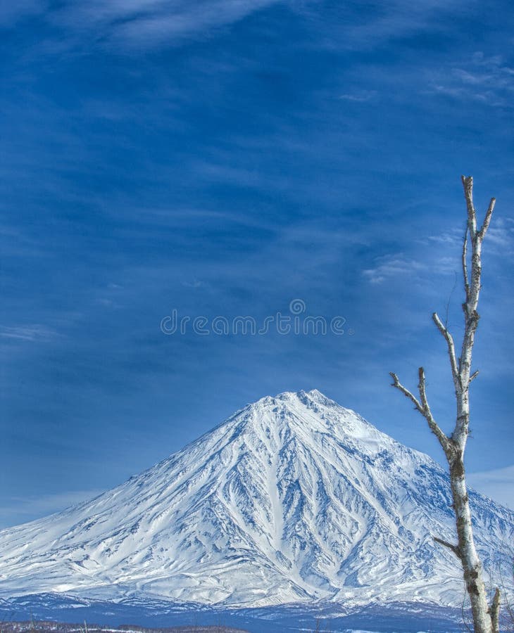 Avachinsky Volcano in Kamchatka and the Blue Sky. Stock Image - Image ...