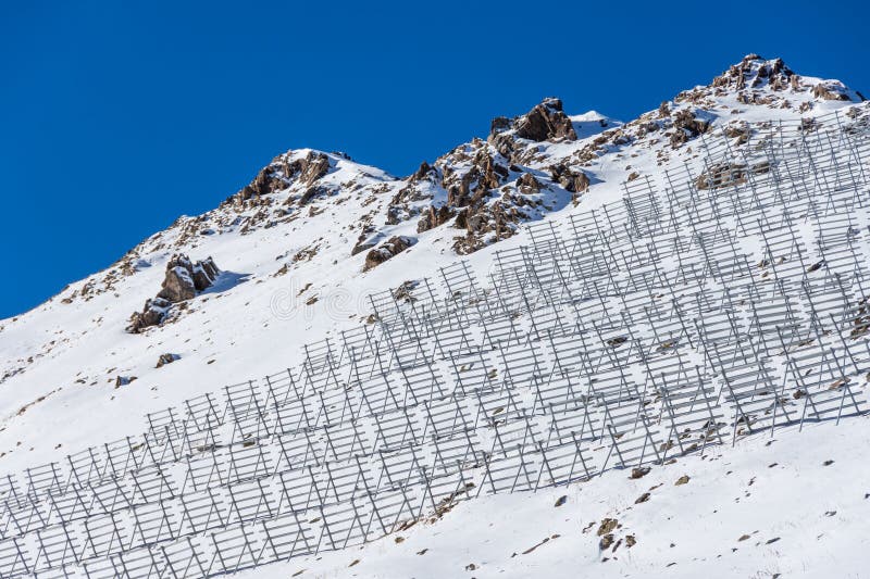 Avalanche Protection Barriers on a Snowy Slope. Stock Photo - Image of ...