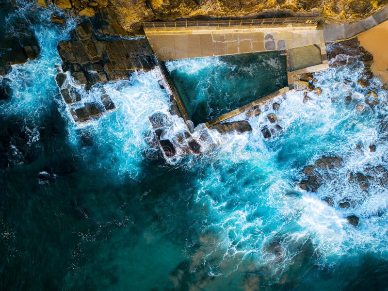 Avalon Rock Pool Sits on a Bed of Broken Rock Waves Crashing Over Stock Image - Image of tidal ...