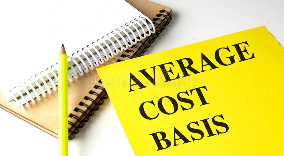 Average Cost Basis Text on Yellow Folder with Spiral Notebooks and ...