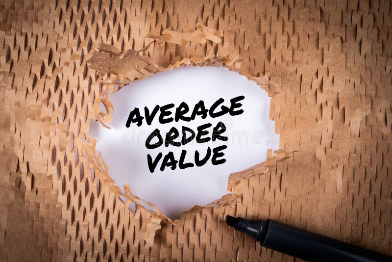 AVERAGE ORDER VALUE. Black Marker on Torn Cardboard Background Stock ...