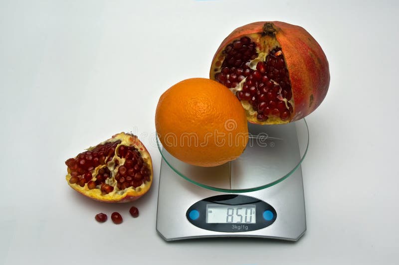 Average Weight Of Orange Pomegranate. Stock Photo - Image of white ...