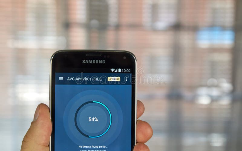 AVG Antivirus on a Cell Phone Editorial Photography - Image of ...