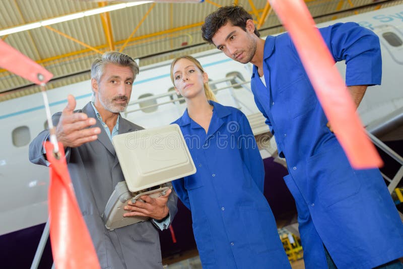 Aviation Students with Instructor Stock Photo - Image of attentive ...