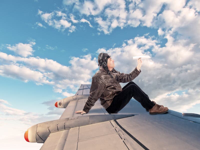 Aviator standing on a wing stock image. Image of caucasian - 107589531