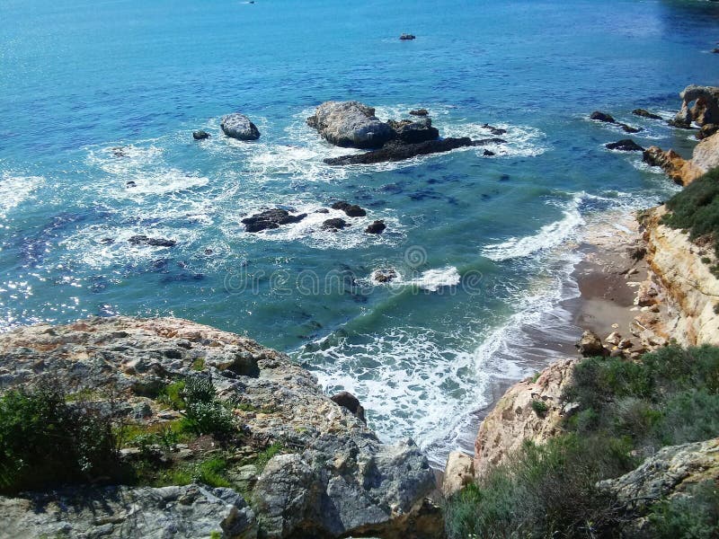 Avila Bay Cliffs stock photo. Image of shore, port, boat - 14193670