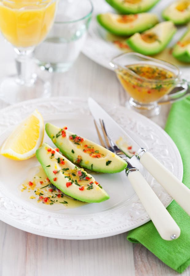Avocado appetizer stock photo. Image of salad, meal, knife - 23288204