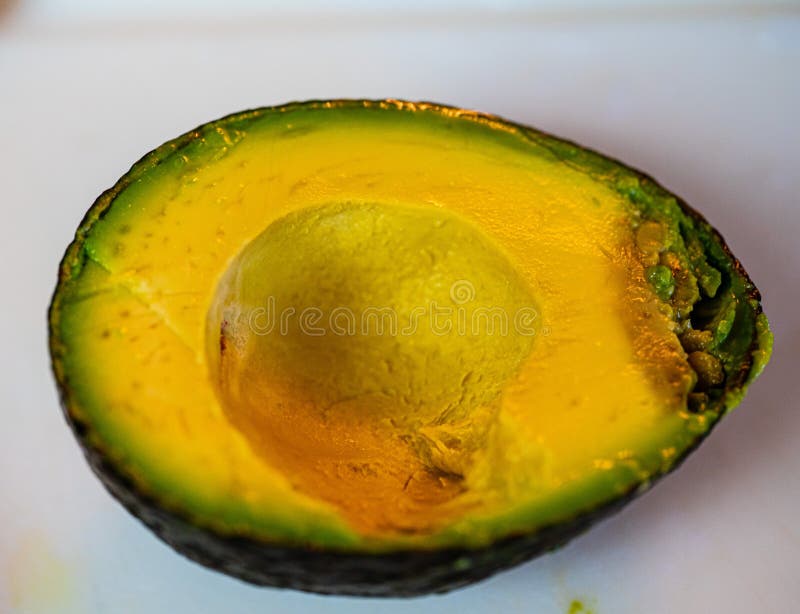 Avocado half stock photo. Image of prepared, yellow - 196142782