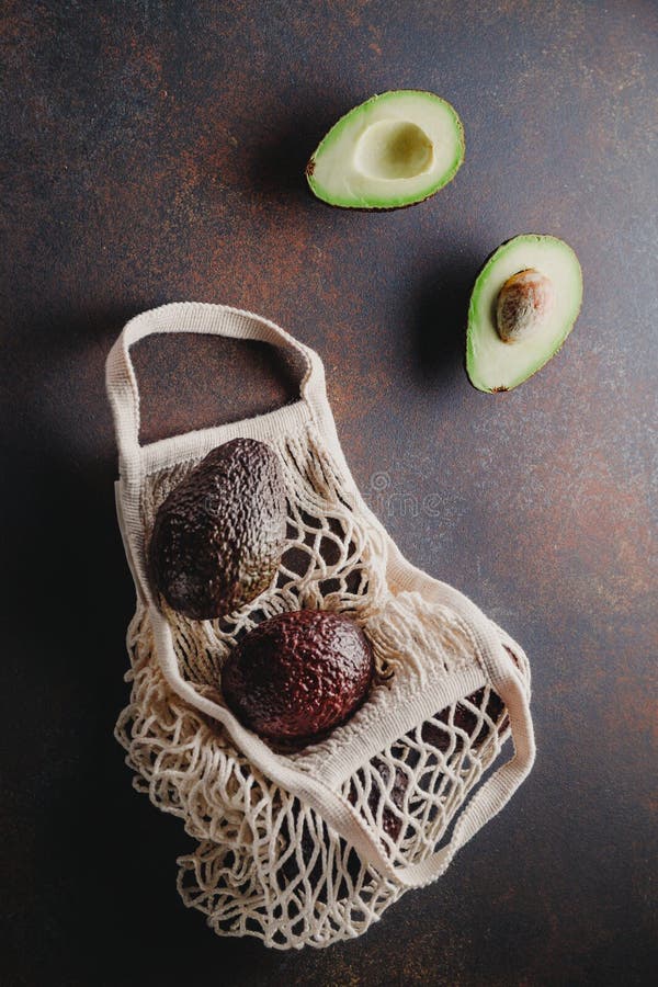 Avocado Hass in a White Eco Net Bag Stock Photo - Image of ecological ...