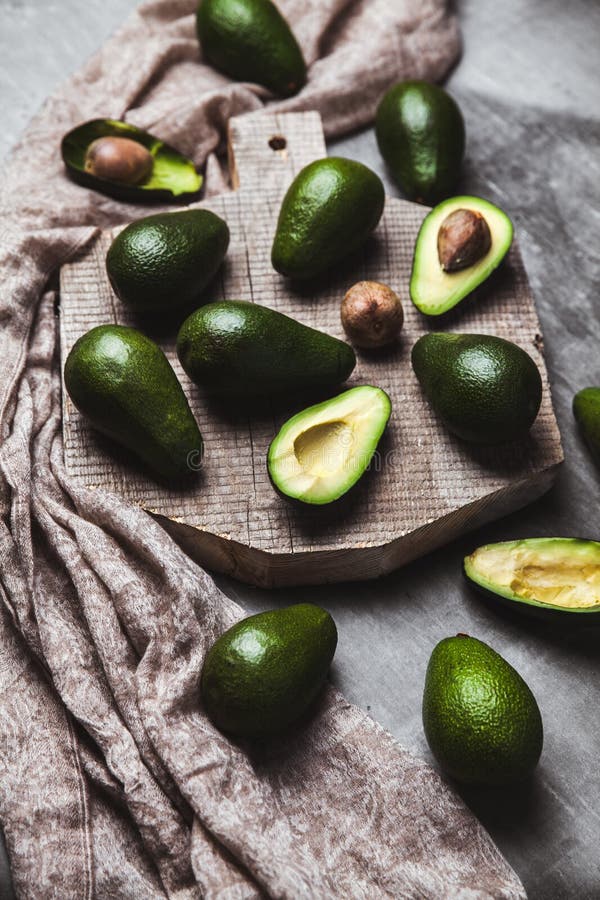 Avocado. Healthy Food on the Table. Rustic Board. Stock Image - Image ...