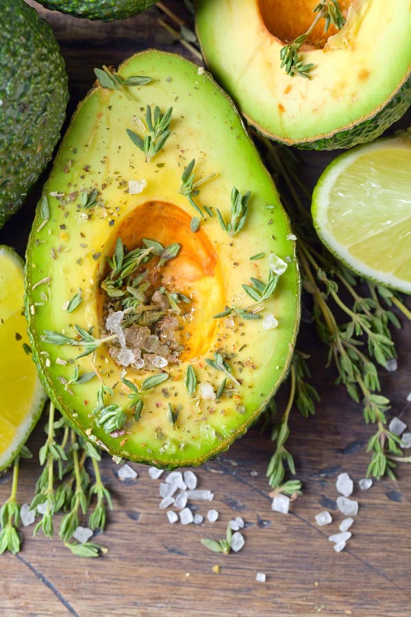 Avocado with Lime on a Wooden Table Stock Image - Image of natural ...