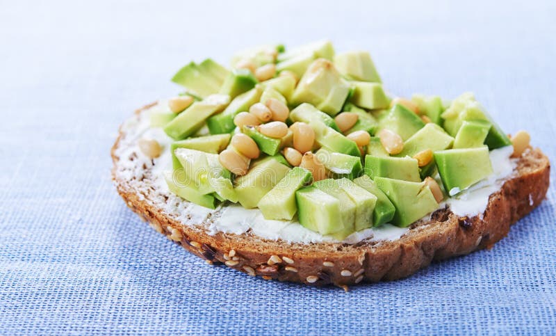 Avocado with ray bread stock photo. Image of appetizer - 74776580