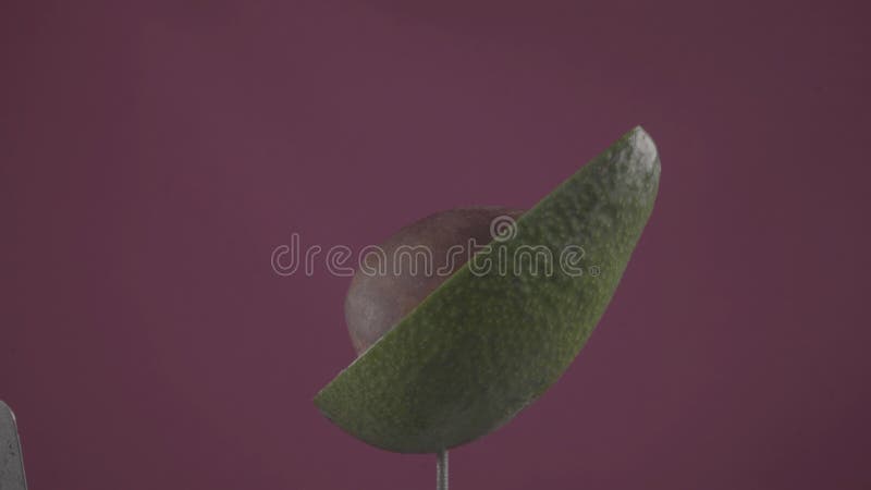 Avocado Rotating with Loop on Fuchsia Screen for Chroma Key Stock ...