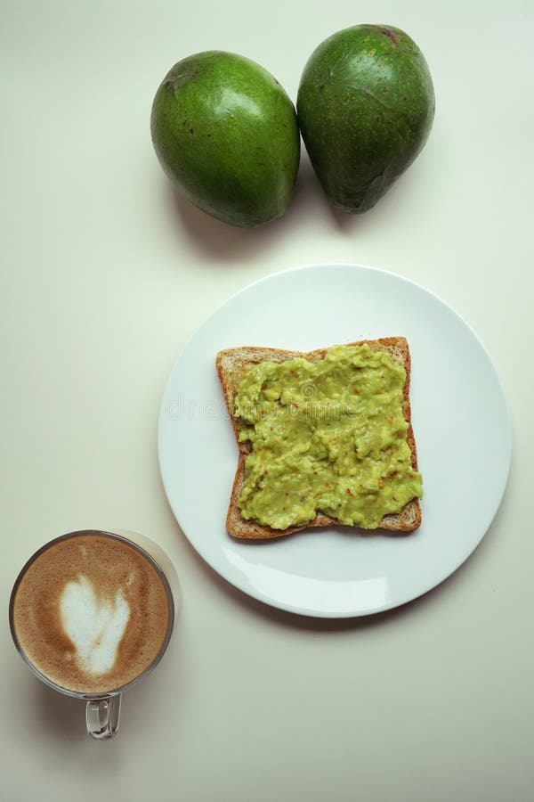 Avocado toast, coffe latte stock image. Image of health - 179088401