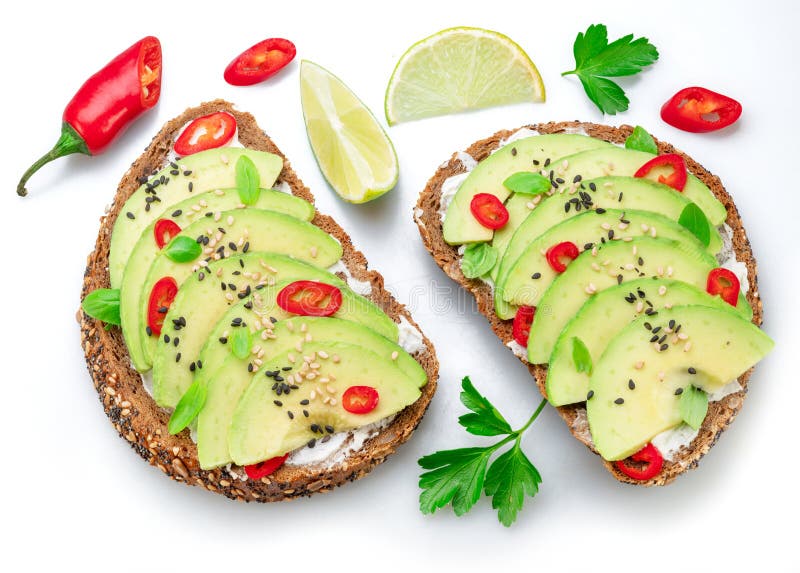 Avocado Toasts - Bread with Avocado Slices, Pieces of Chilli Pepper and ...