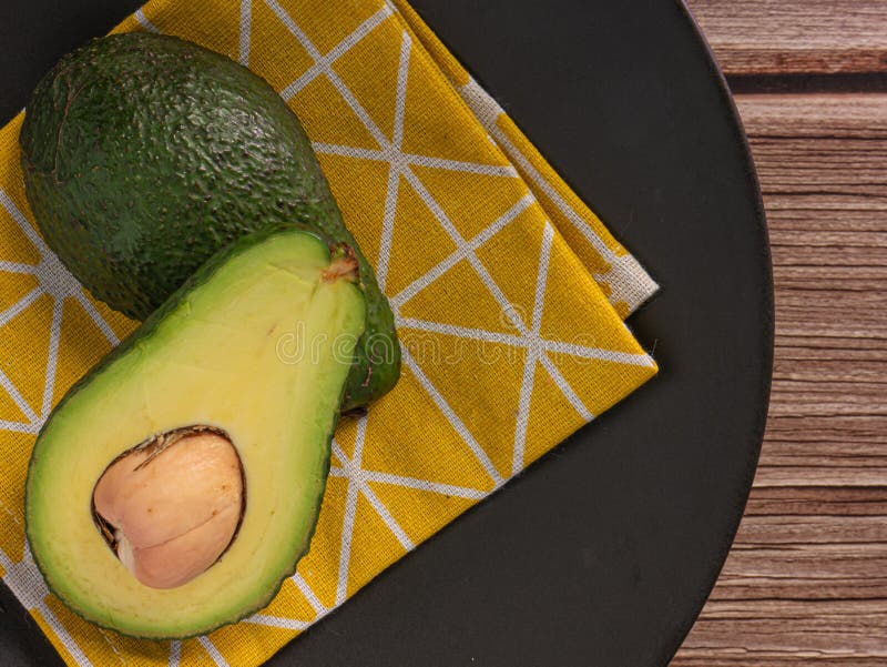 Avocado on Wood Table Top View Image for Food Concept Stock Photo ...
