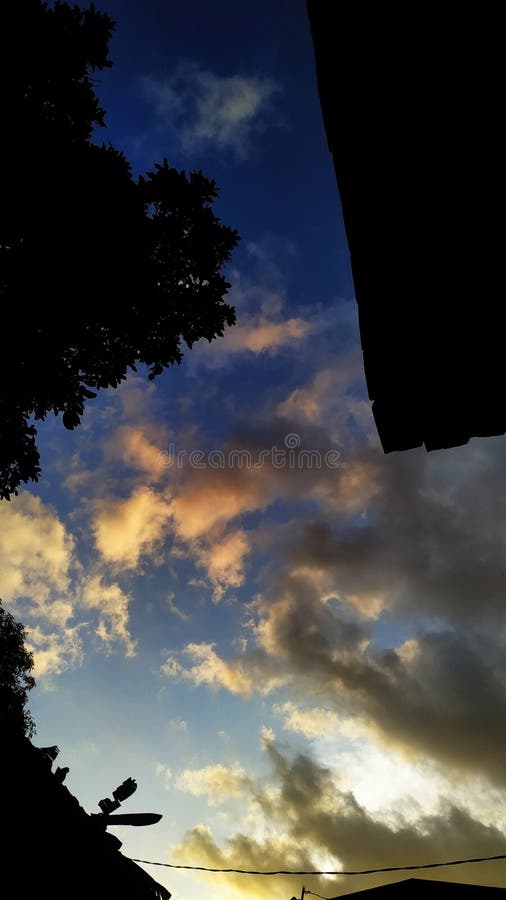 Awan panas biru stock photo. Image of sunset, sunlight - 261652384