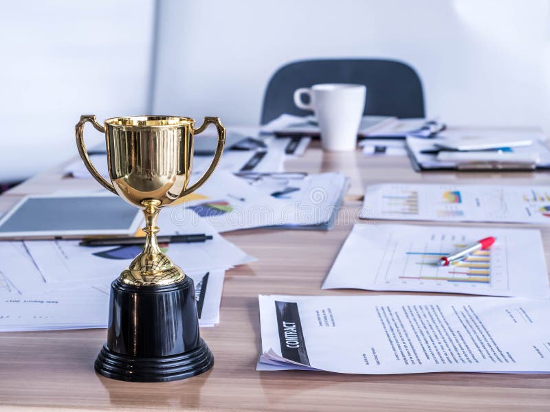Award Trophy on Working Table with Document and Contract Stock Photo ...