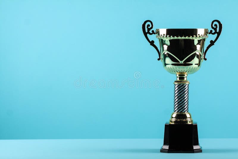 Award Winning Trophy in Blue Background Stock Photo - Image of ...