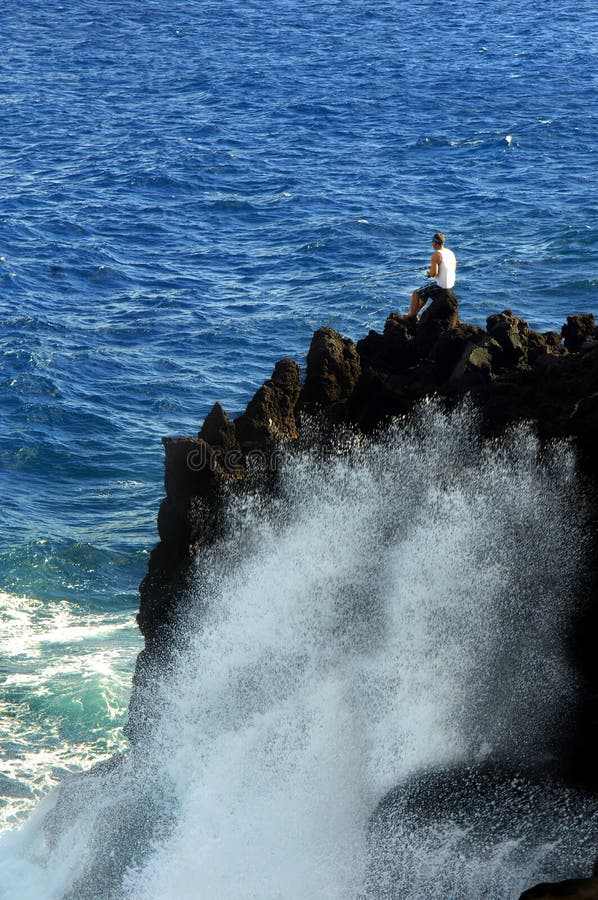 Aware of the Danger stock photo. Image of cliffs, fisherman - 11063058