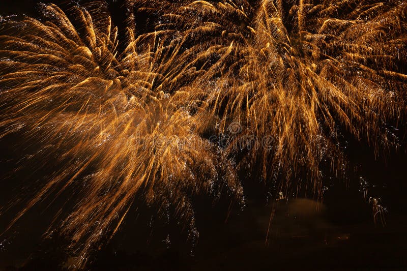 Awesome Cascade of Lights Created by the Explosion of Gilded Fireworks ...