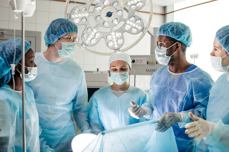 Awesome Diverse Doctors Solving Problems during Operation Stock Image ...