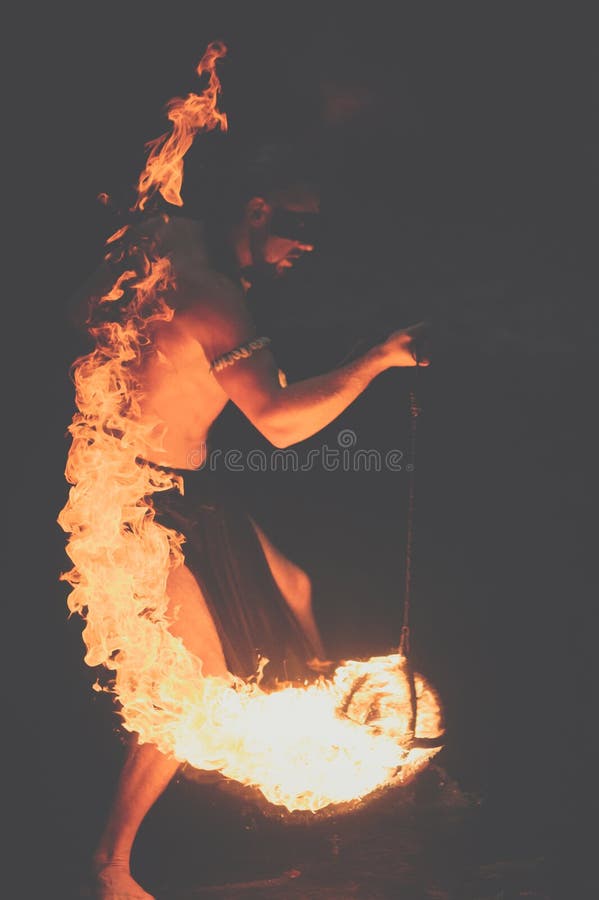Awesome Fire Show at the Waterfall. Brutal Muscle Man Stock Image ...