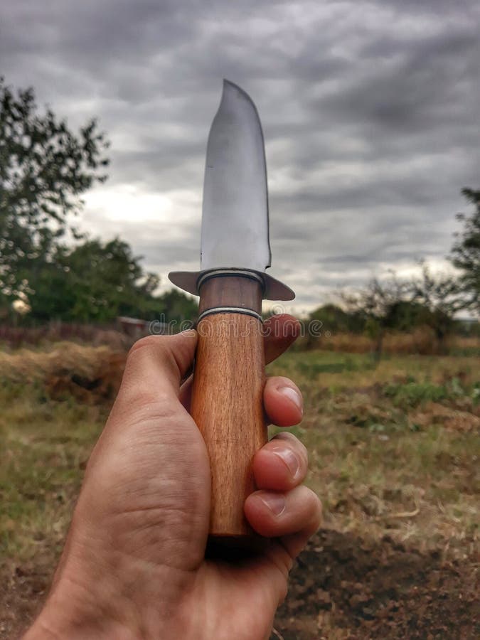 Awesome knife stock image. Image of awesome, held, nature - 129217871