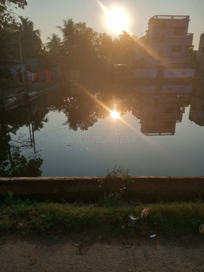 Awesome Reflection of Rising Sun Stock Photo - Image of outdoor ...