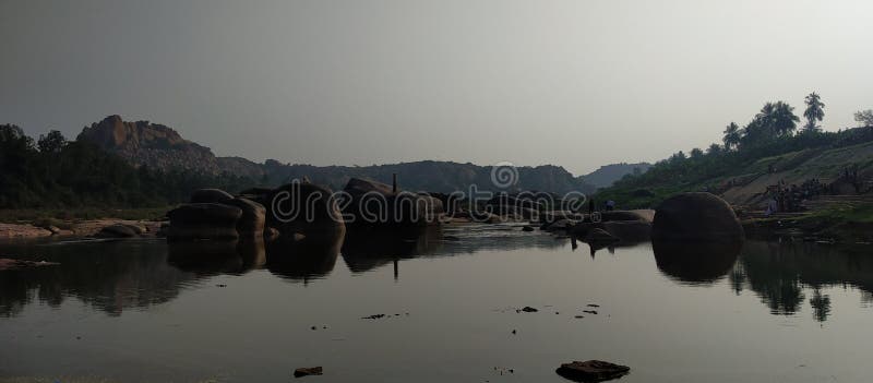 Awesome Reflection in Tungbhadra River Stock Photo - Image of unesco ...