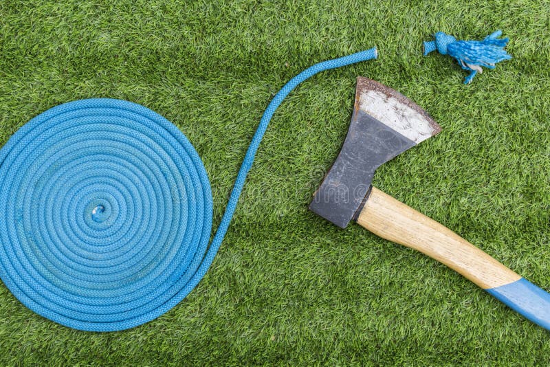 Ax and Blue Rope in the Garden Stock Photo - Image of expedition, brave ...
