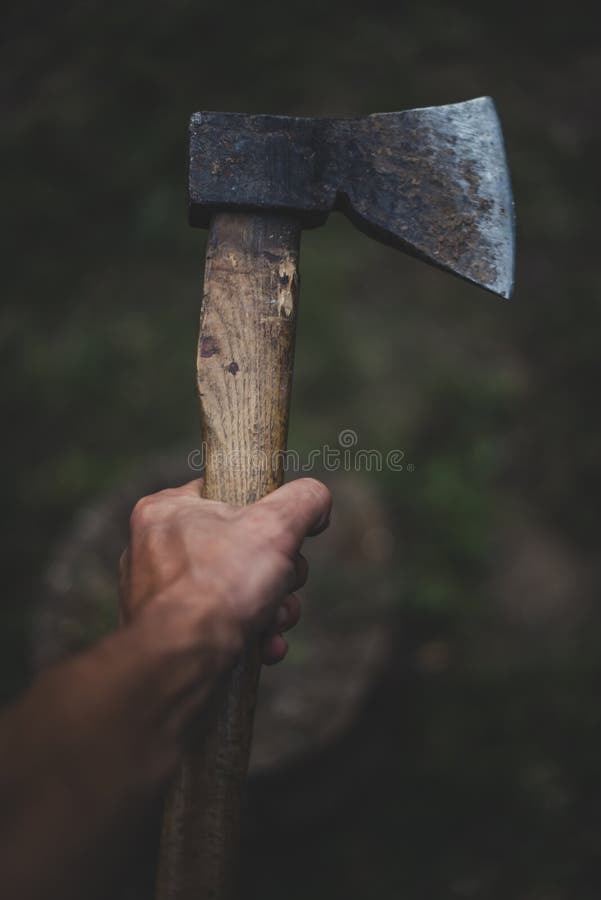 Ax in the man hand stock photo. Image of handle, brown - 138766512