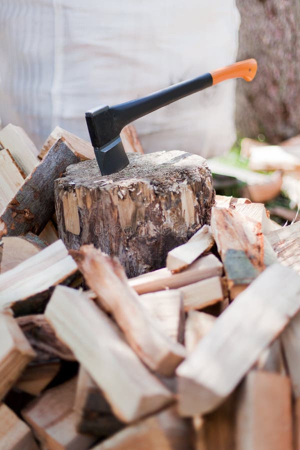 Axe in Log with Chopped Wood Stock Photo - Image of beautiful ...