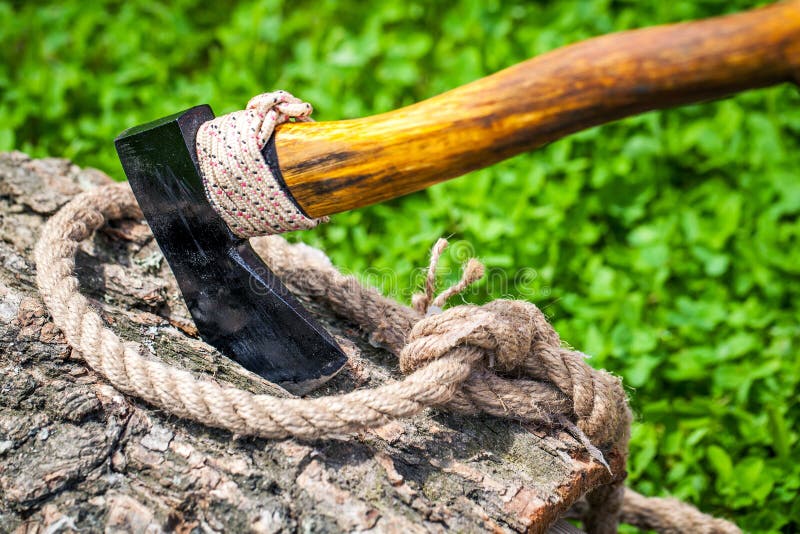 Axe and rope on wood stock photo. Image of wood, cutter - 41817064