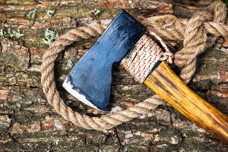 Axe and rope on wood stock photo. Image of handle, block - 41817092