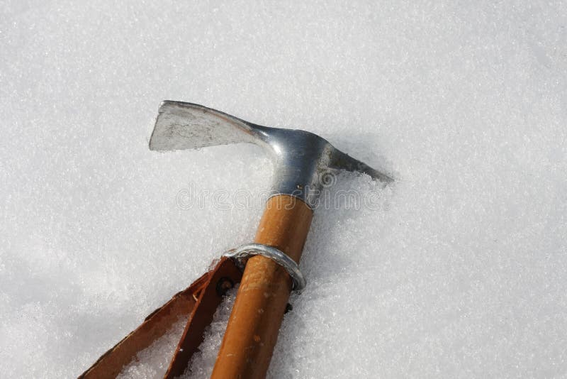 Axe Stuck in the Cold Snow in the Mountains in Winter Stock Photo ...