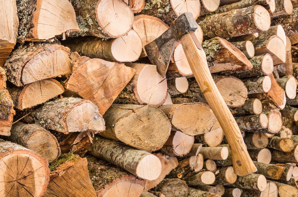 Axe Stuck in a Stack of Wood Stock Photo - Image of chopup, ecological ...
