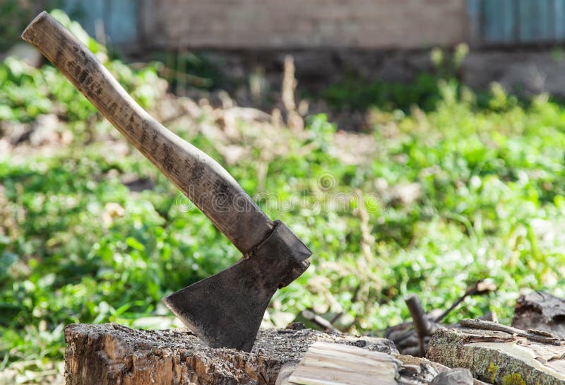 Axe stuck in tree stock image. Image of lumberjack, farm - 45642777