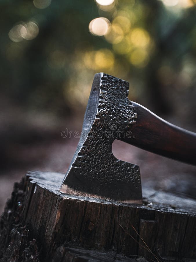 Axe Embedded in a Weathered Wooden Stump Stock Photo - Image of ...