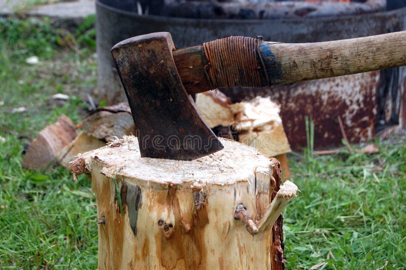 Axe in Wood Log stock photo. Image of physical, outdoors - 93742942