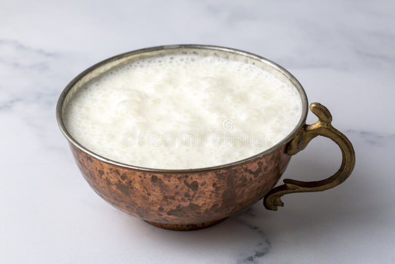 Ayran - Traditional Turkish Yoghurt Drink in a Copper Cup Stock Image ...