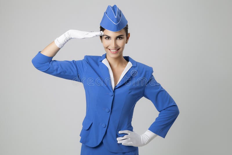 Azafata Encantadora Vestida En Uniforme Del Azul Imagen de archivo ...