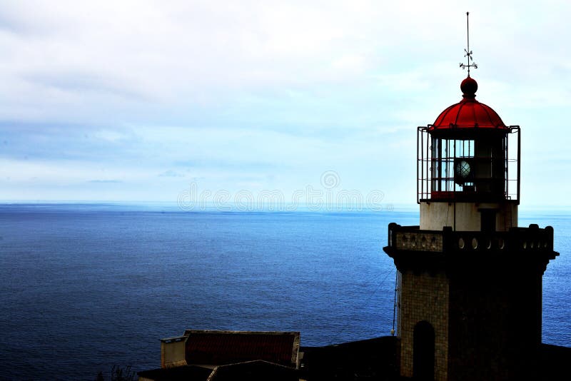 Azorean Lighthouse Overlooking the Blue Ocean Stock Image - Image of ...