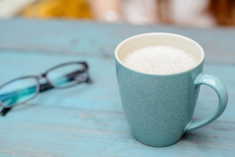 Azure Cup of Coffee on Table Stock Photo - Image of milk, glasses: 76032902