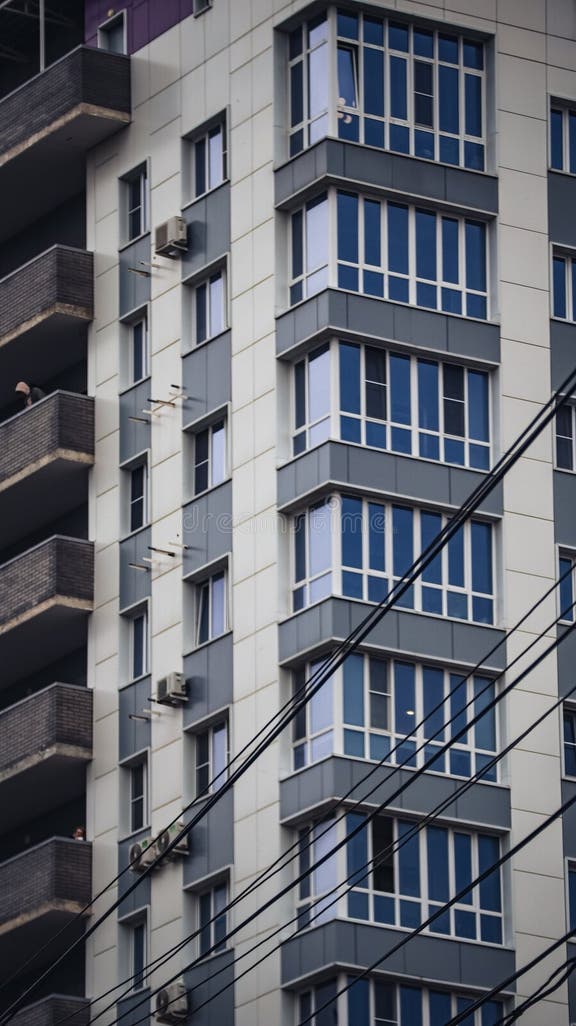 Azure Elegance: Sleek Skyscraper with White Tile and Cobalt Windows ...